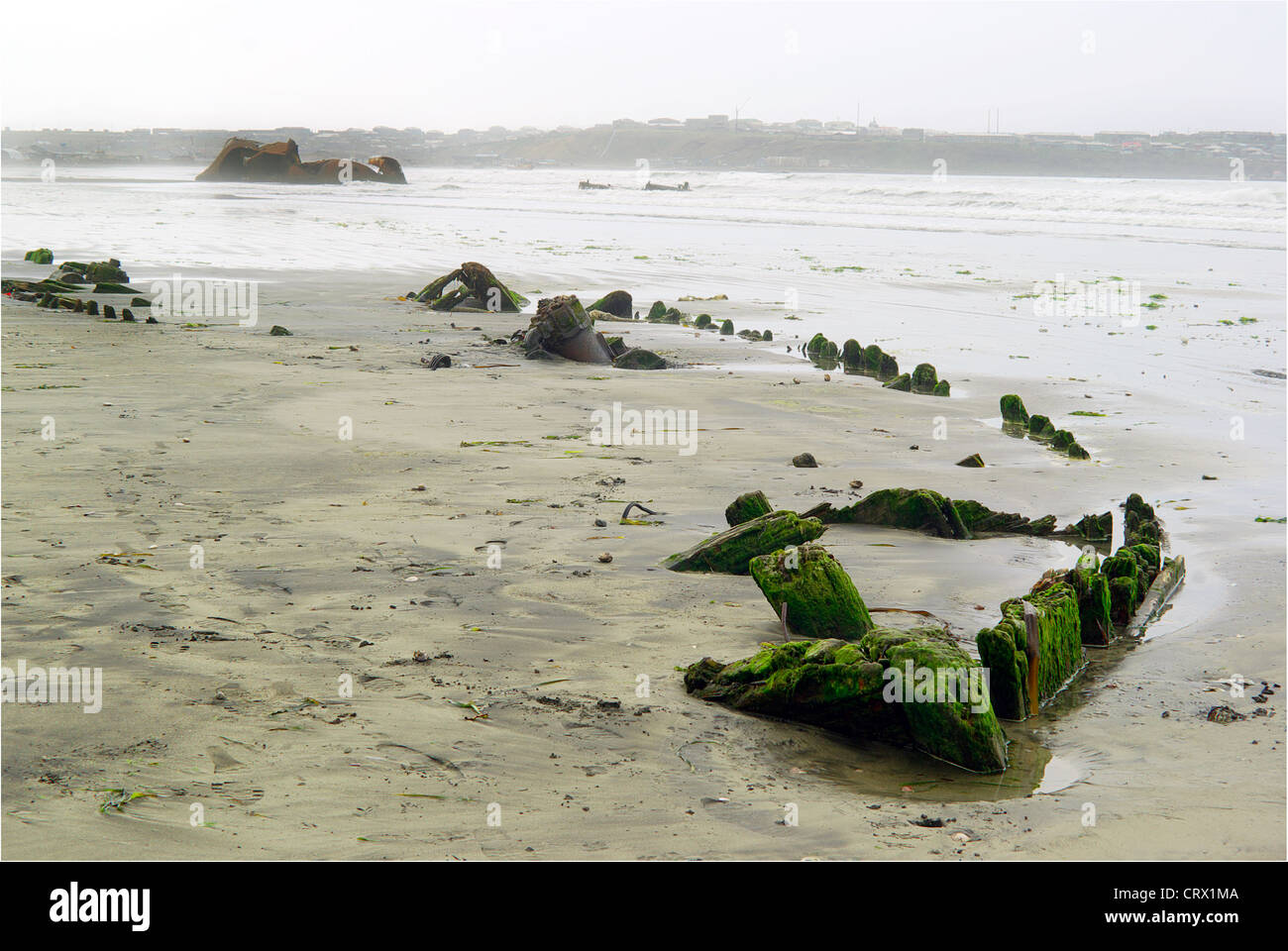 Old ship wreck in harbor at Yuzhno Kurilsk, Kunashir Island, chain of ...