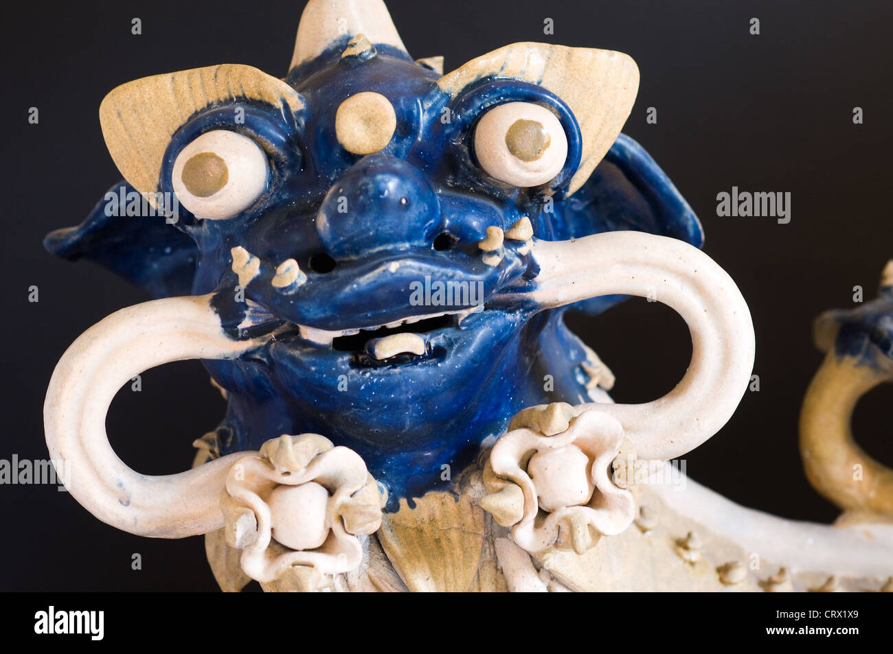 Ceramic Thai gargoyle Stock Photo - Alamy
