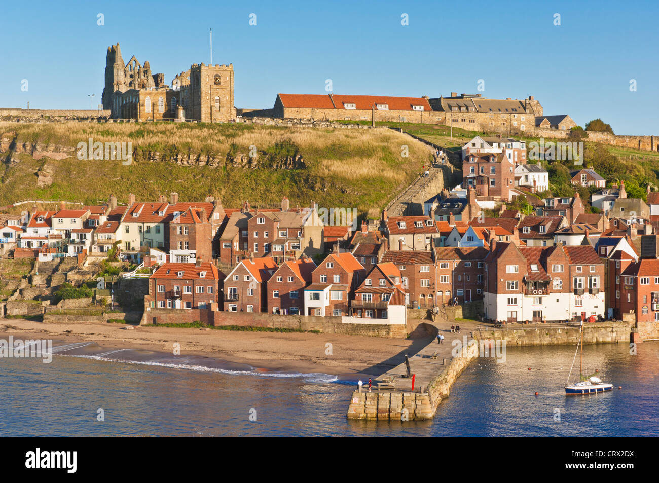 whitby abbey ruins church old town seafront beach and harbour north ...