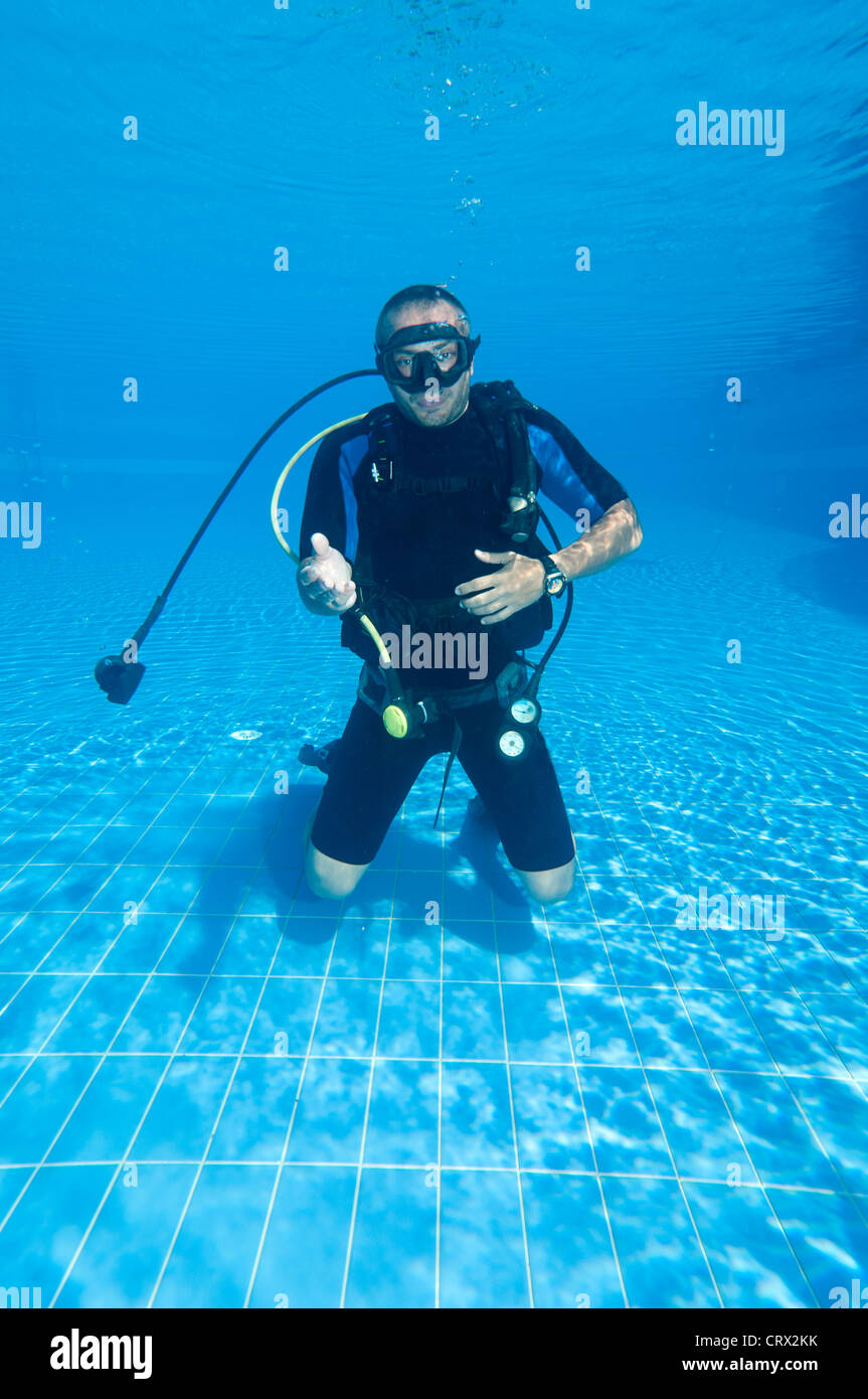 Learning to Scuba Dive in a Swimming Pool Stock Photo - Alamy