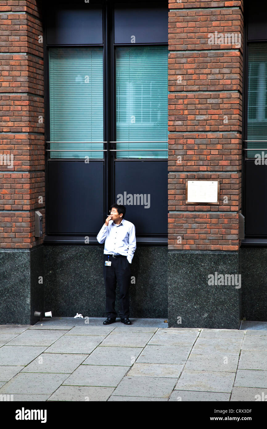 Office smoker worker hi-res stock photography and images - Alamy