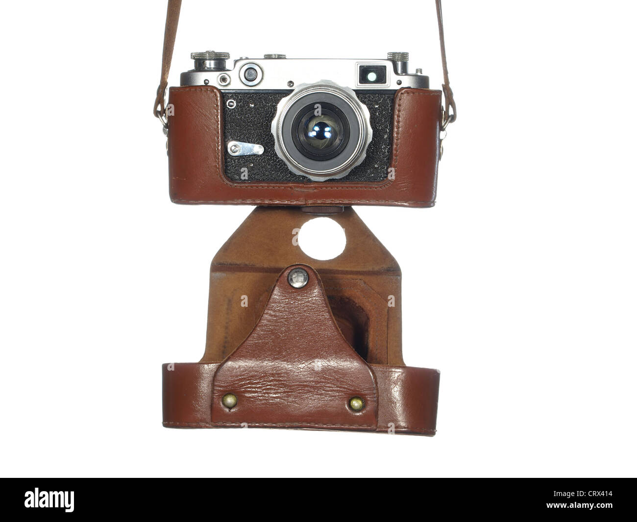 Classic vintage camera in a leather cover, isolated on white background ...