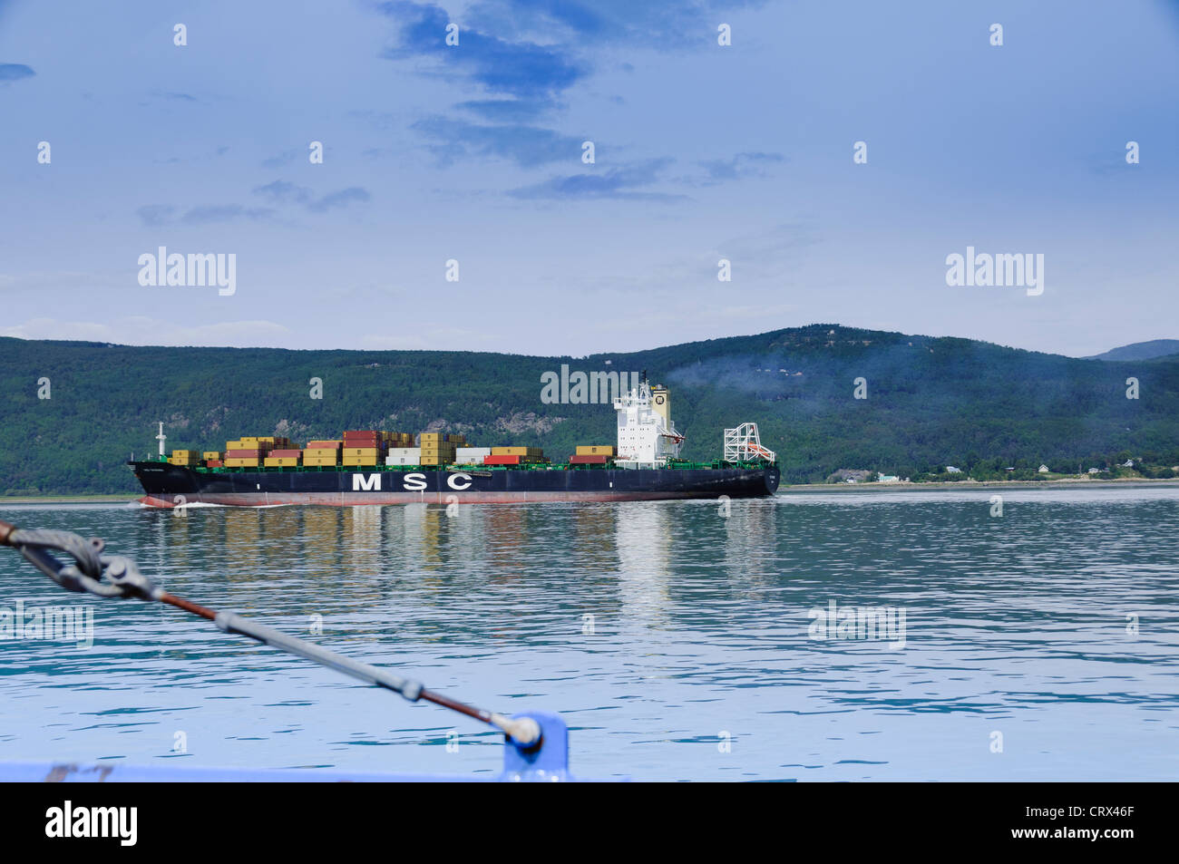 container ship on St Lawrence river coming from Panama arriving in port ...