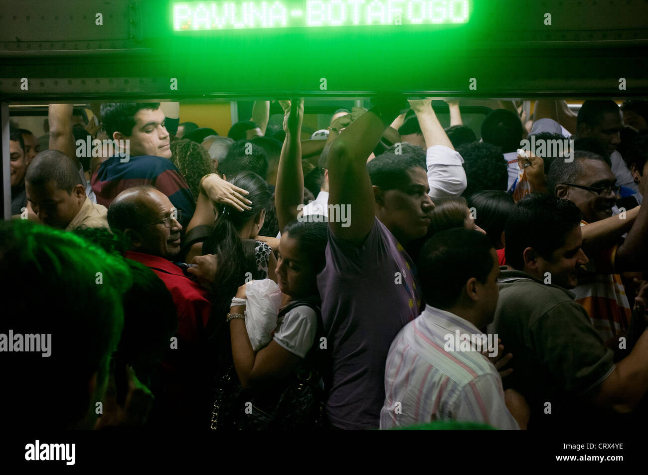 People trying to get into the train at Carioca Station subway in ...