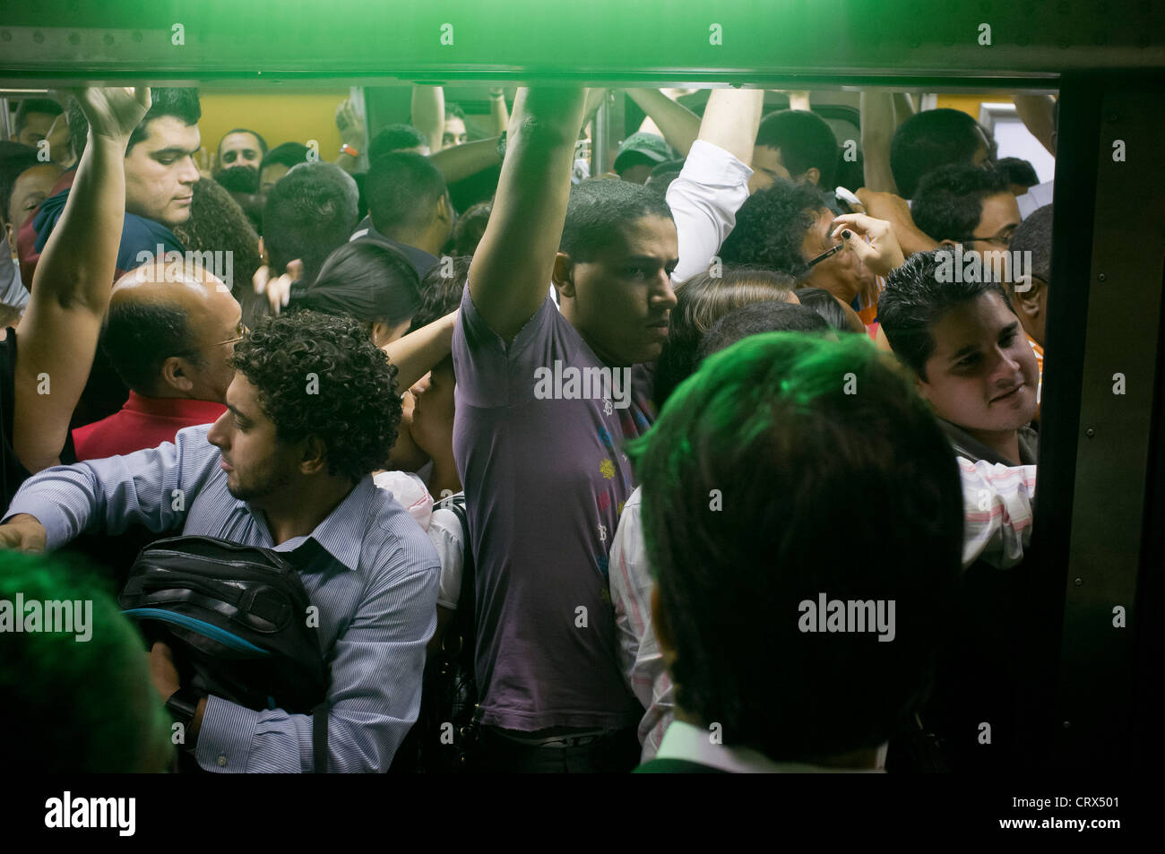 People trying to get into the train at Carioca Station subway in ...