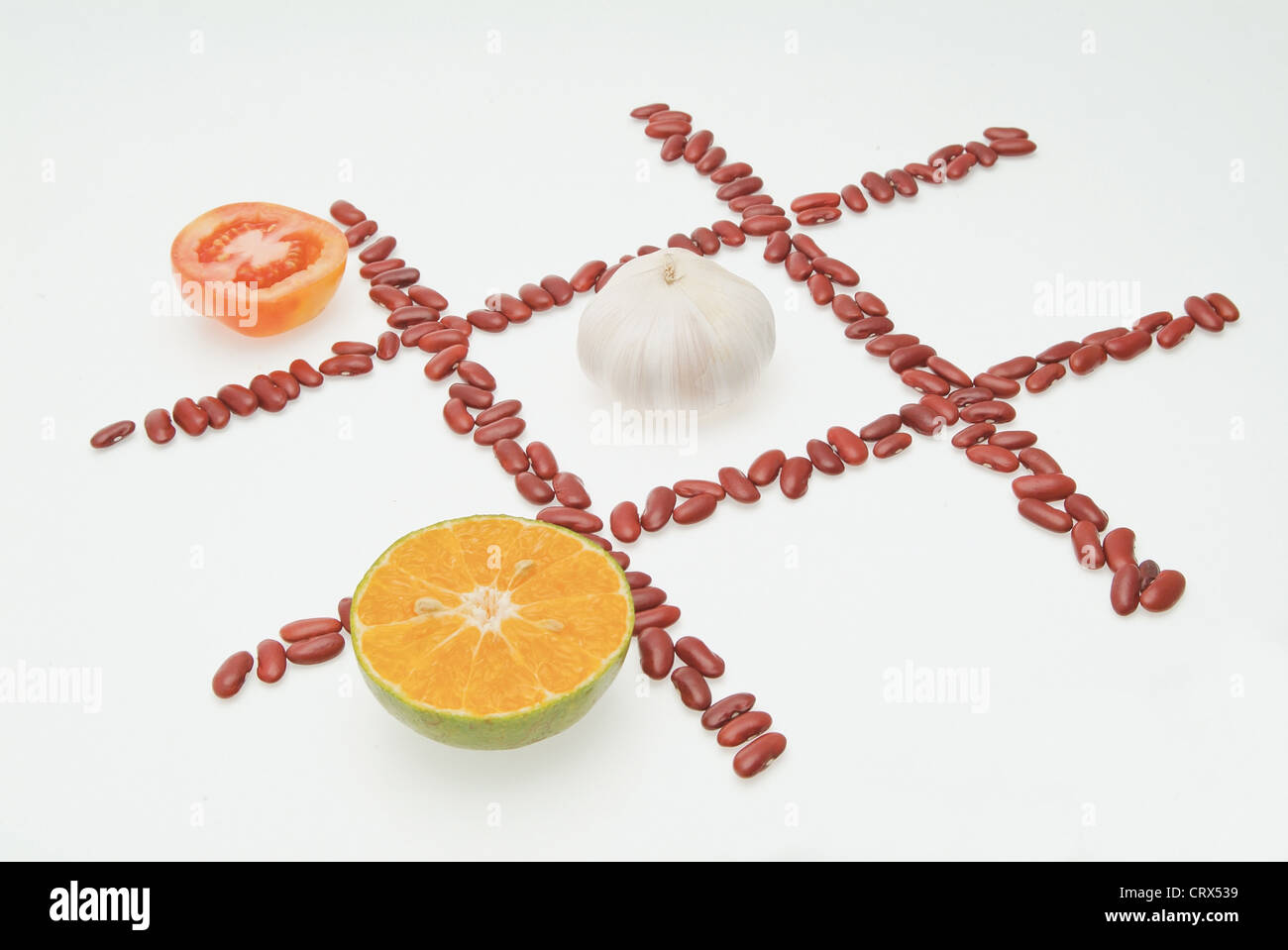 tomato and garlic and orange Stock Photo - Alamy