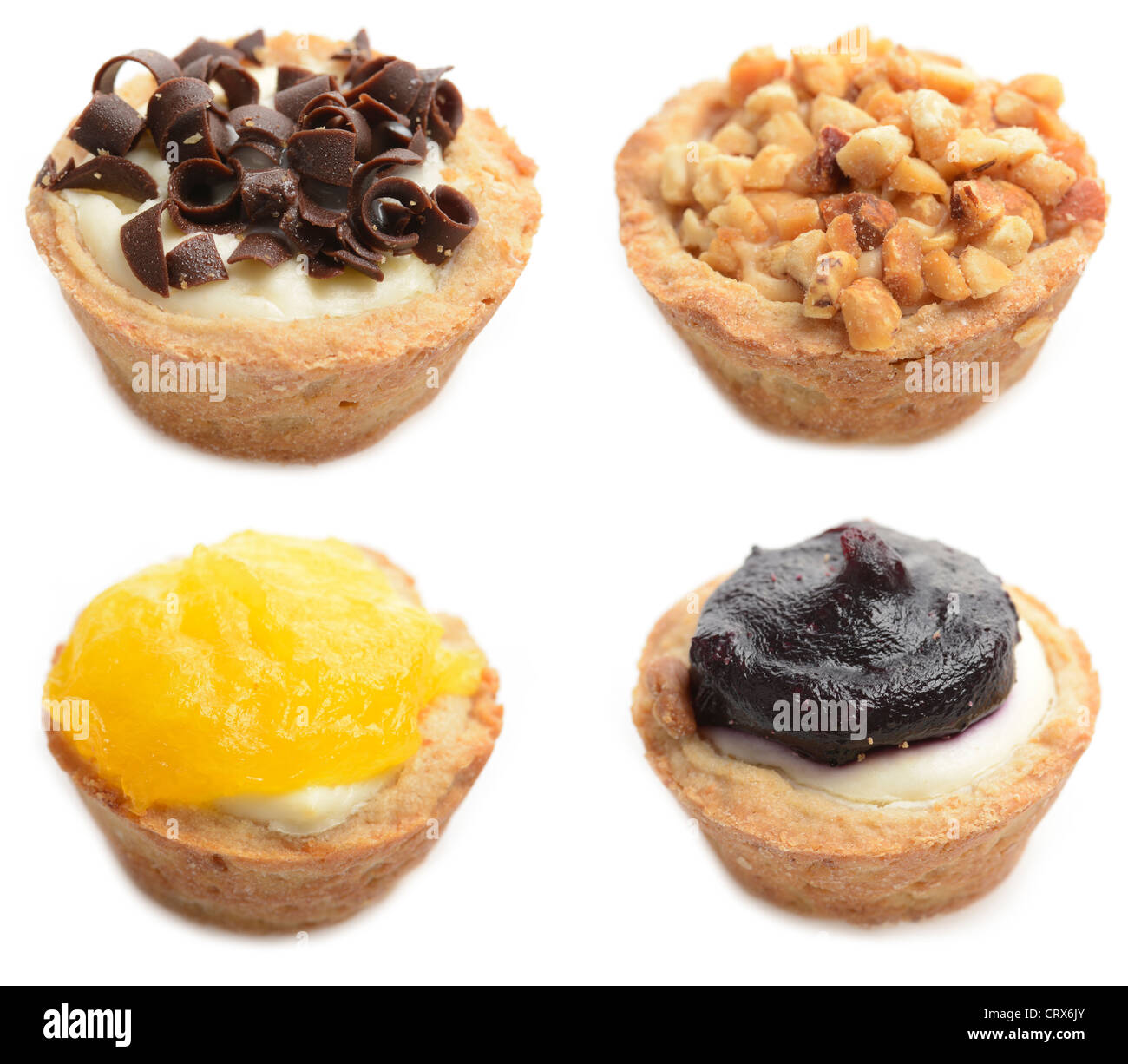 Assortment Of Small Round Cheesecakes On White Background Stock Photo ...