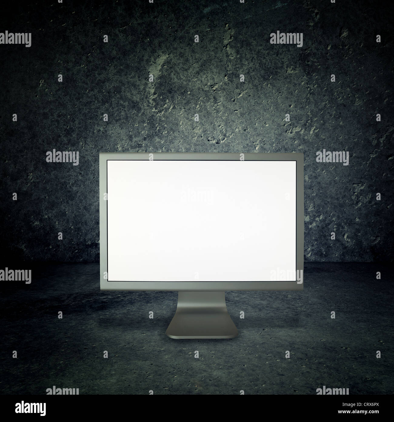 Computer monitor in a grunge concrete room Stock Photo - Alamy
