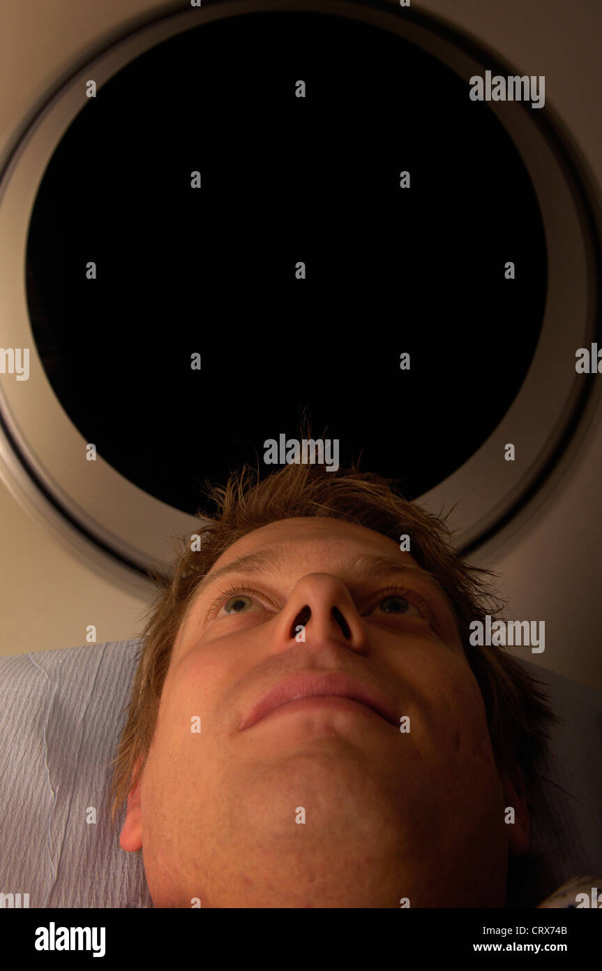 A man having a CAT scan Stock Photo - Alamy