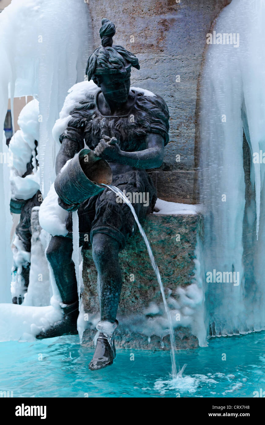 Frozen Figure at the Fish Fountain Stock Photo - Alamy