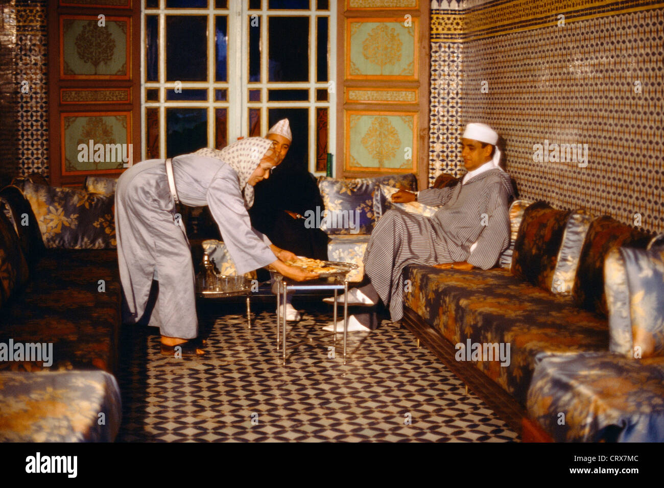 Fes Morocco Tea Being Served in sitting room Stock Photo - Alamy