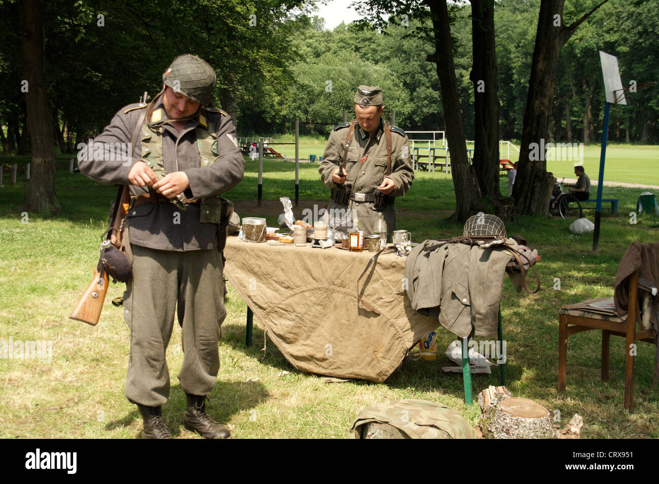 soldiers near table Stock Photo - Alamy