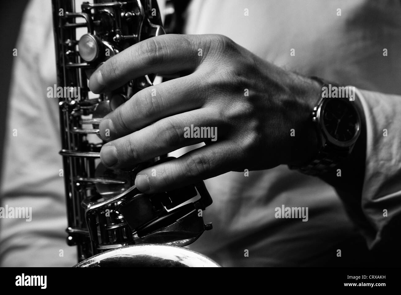 Playing saxophone white hi-res stock photography and images - Alamy