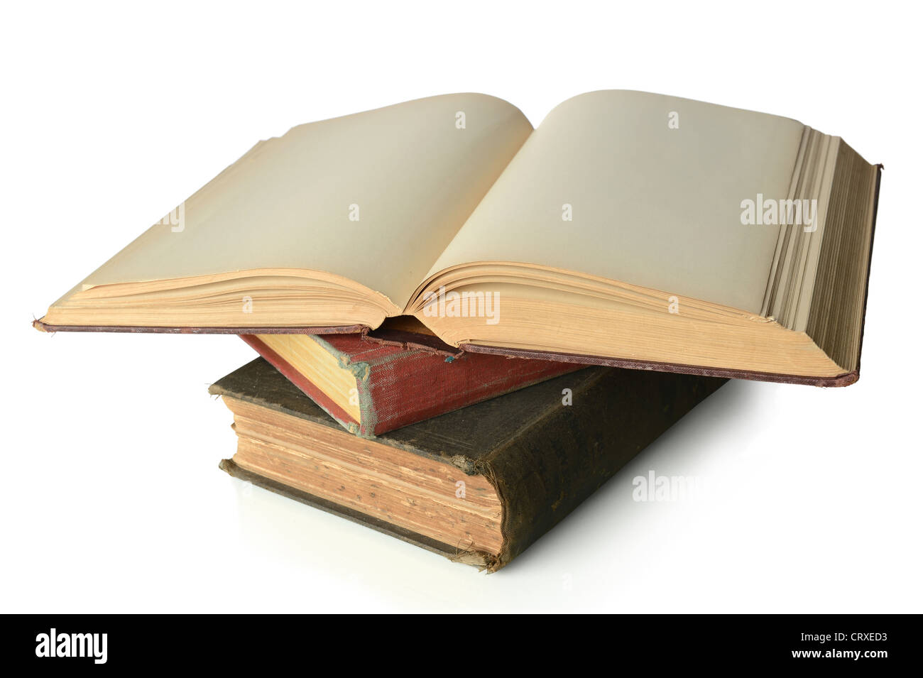 Stack on old vintage books with open one on top isolated over white ...