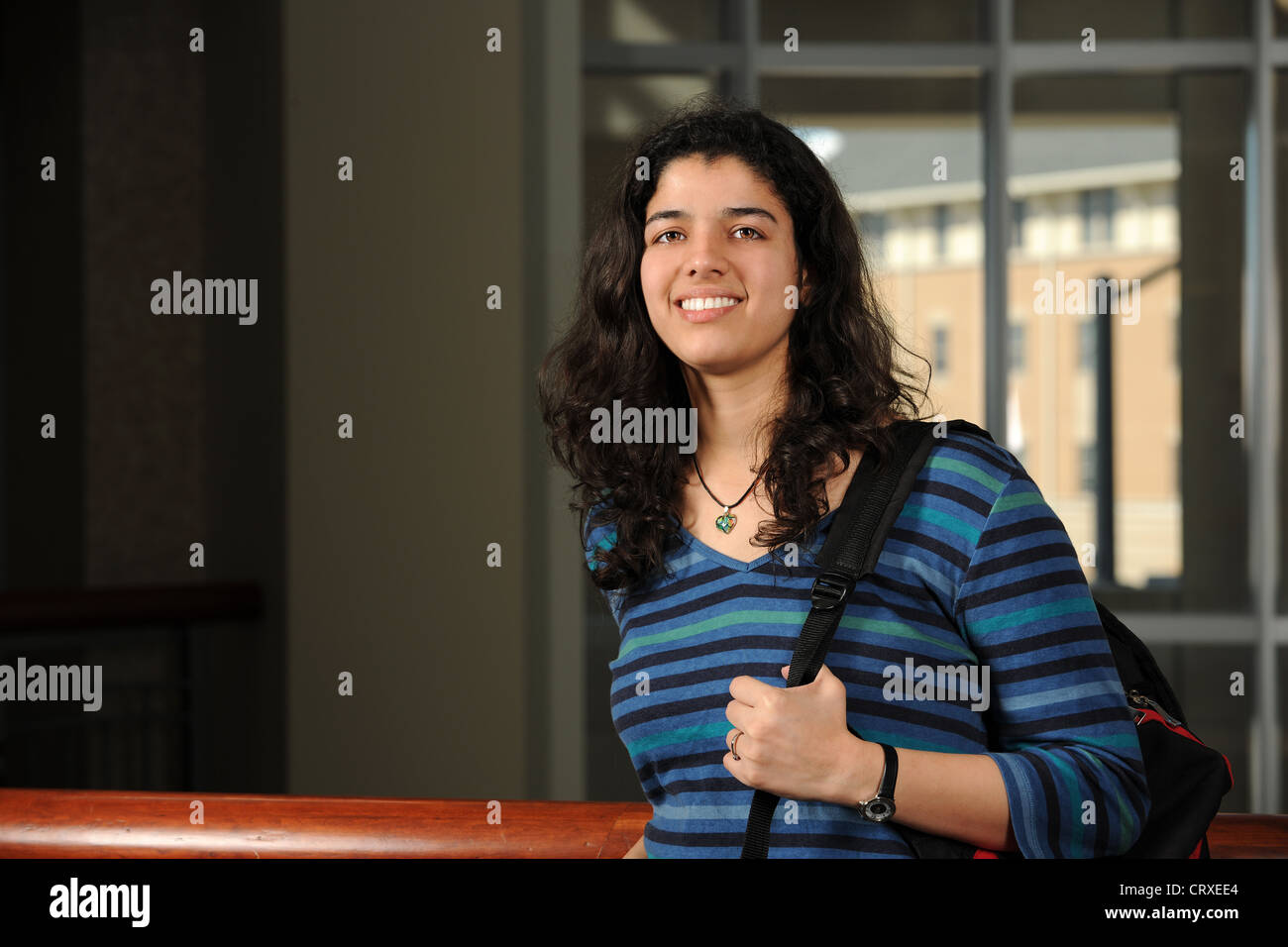 Portrait of young Indian student smiling indoors Stock Photo - Alamy