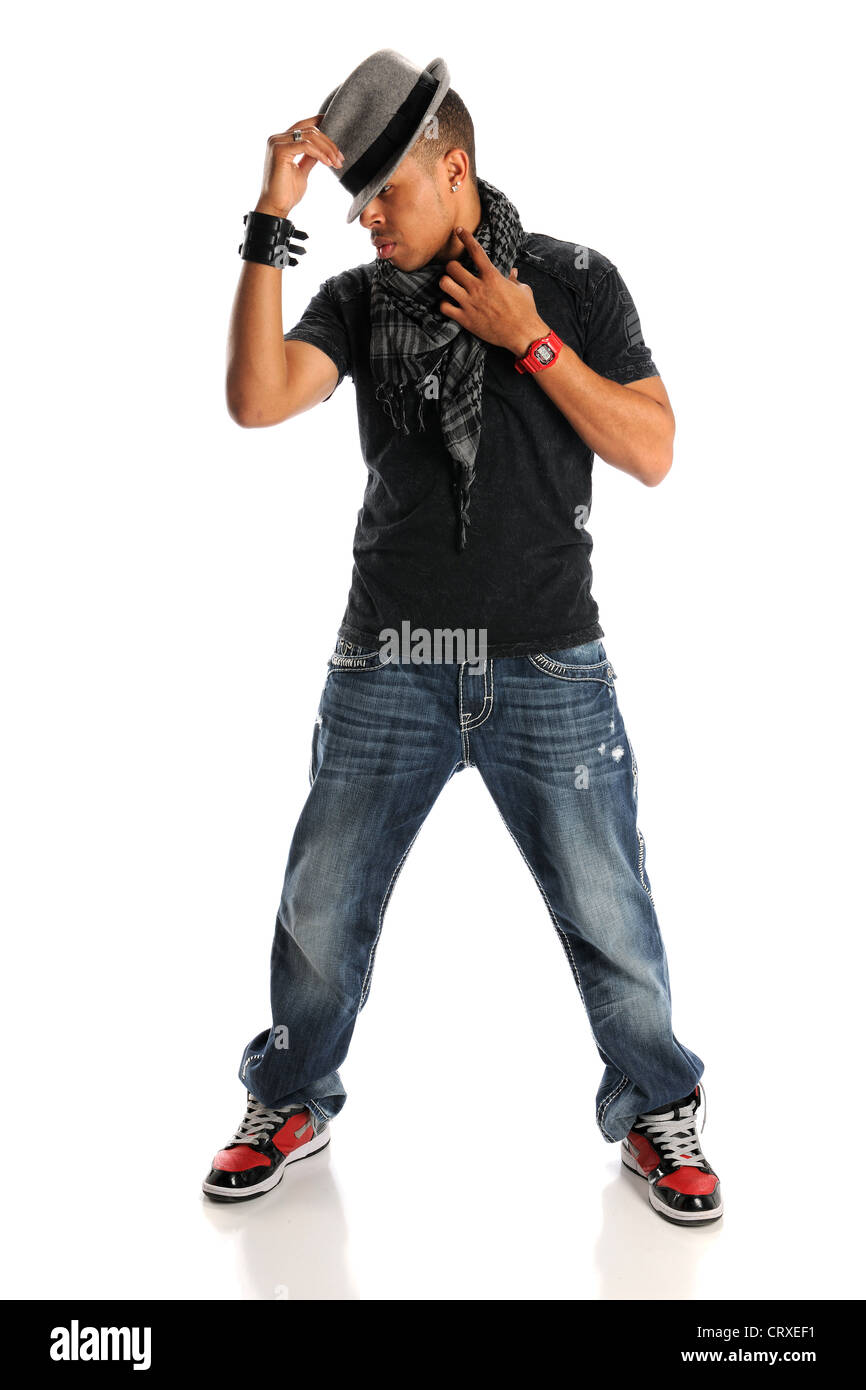 African American hip hop dancer tipping hat standing isolated over ...
