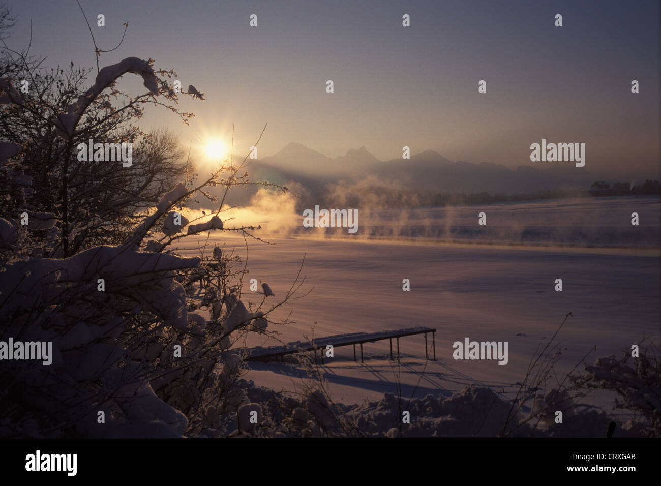 Wintry sunset at Forggensee Stock Photo - Alamy