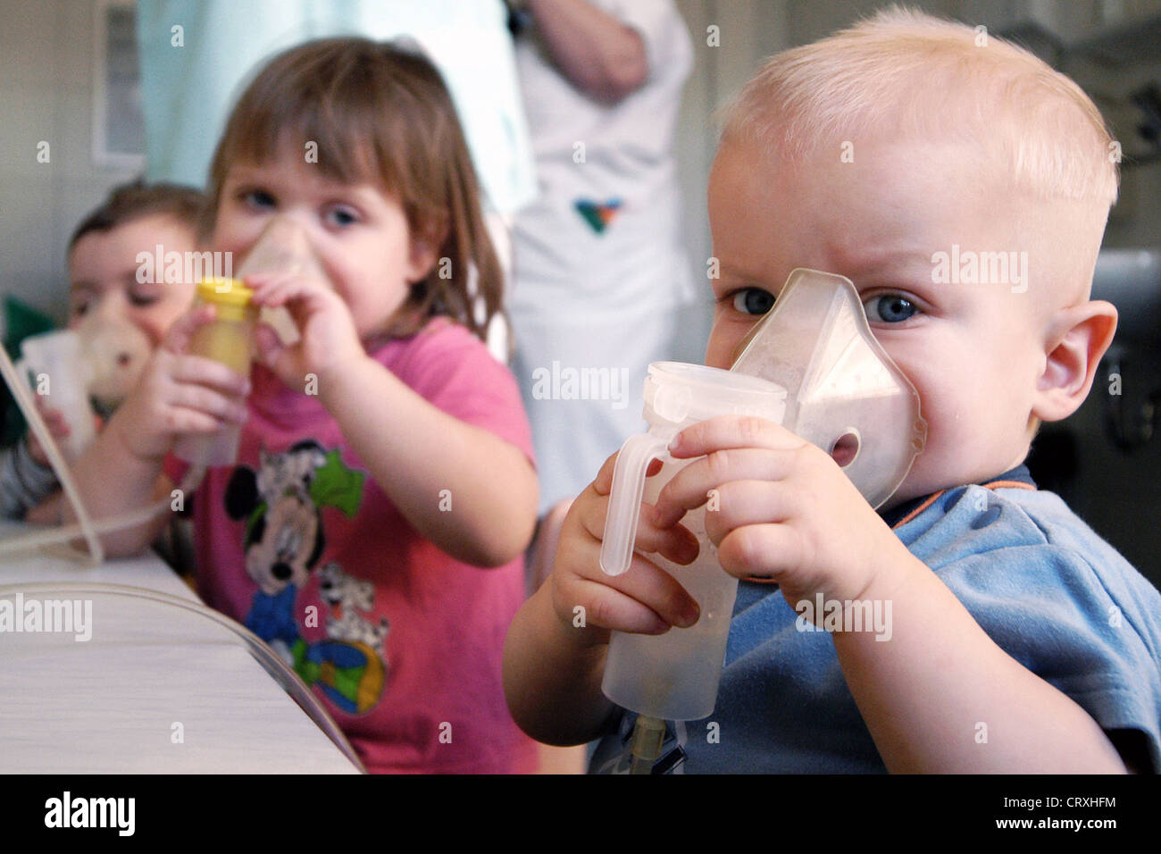 Children with chronic asthma inhalation therapy Stock Photo - Alamy