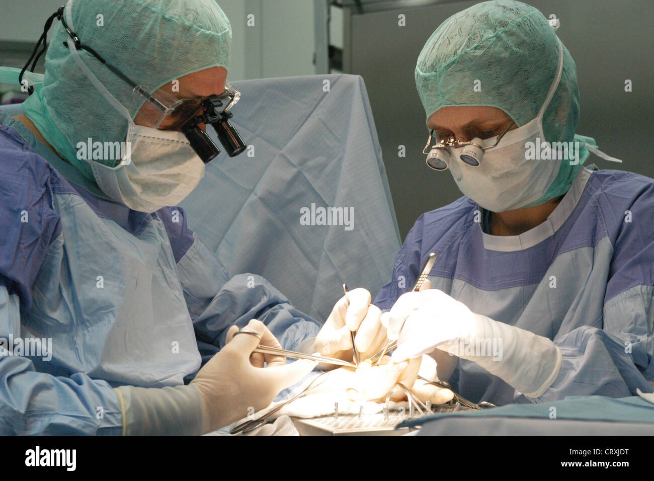 Surgeons in the operating room at a hand surgery Stock Photo - Alamy