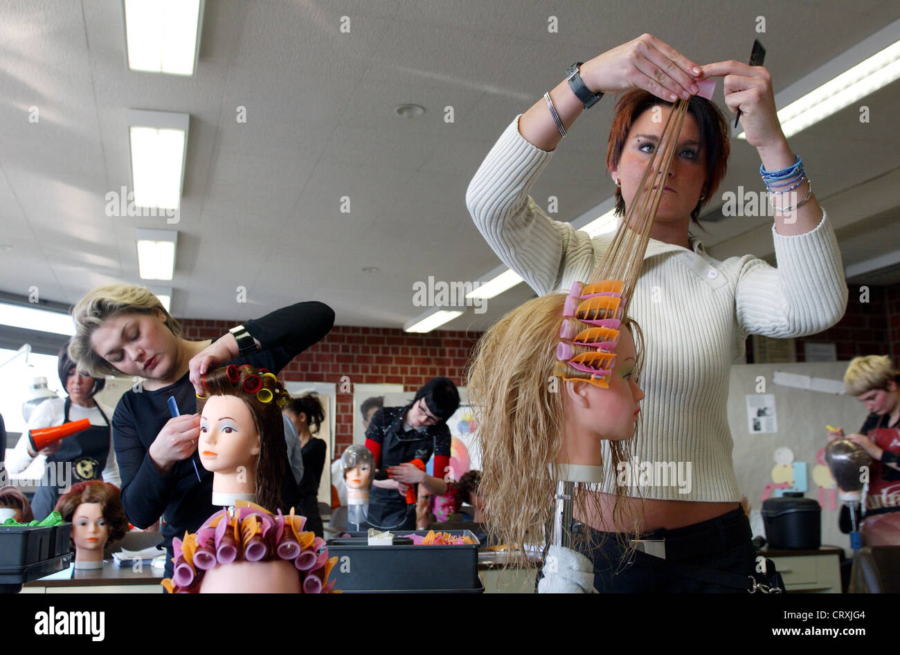 Hairdresser teaching hi-res stock photography and images - Alamy