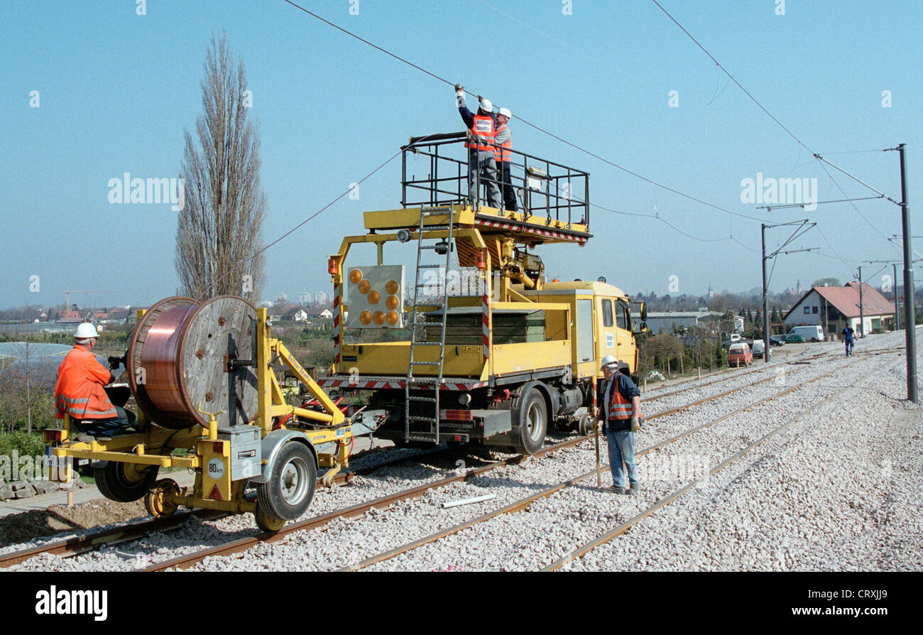 Installation work on the catenary a new tram line Stock Photo - Alamy