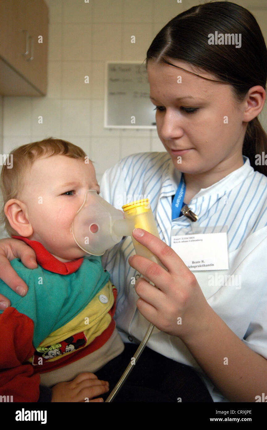 From chronic asthma sick child in inhalation therapy Stock Photo - Alamy