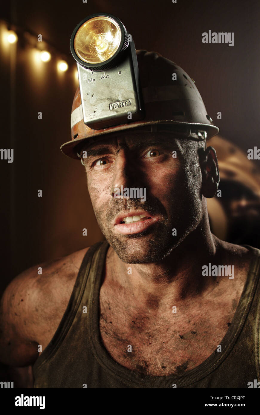 Mine worker with helmet and full body coal dust Stock Photo - Alamy