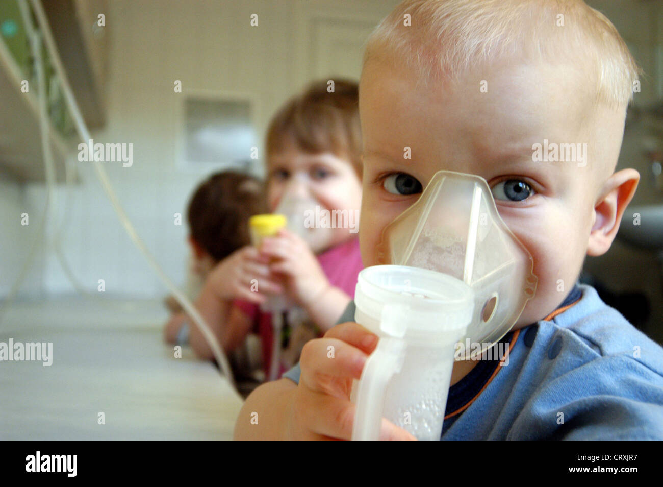 Children with chronic asthma inhalation therapy Stock Photo - Alamy
