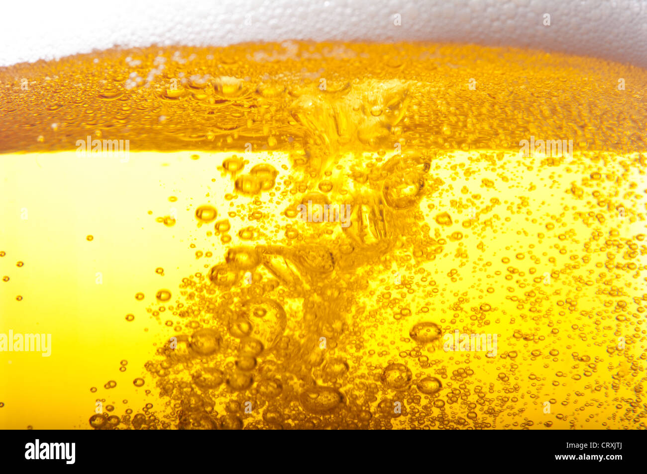 Pouring beer into a mug Stock Photo - Alamy