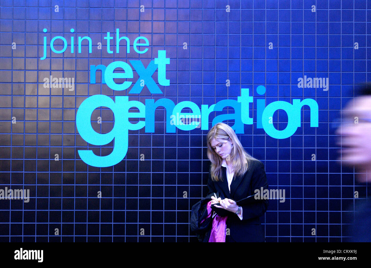 Join the next generation, Cebit 2004 Stock Photo - Alamy