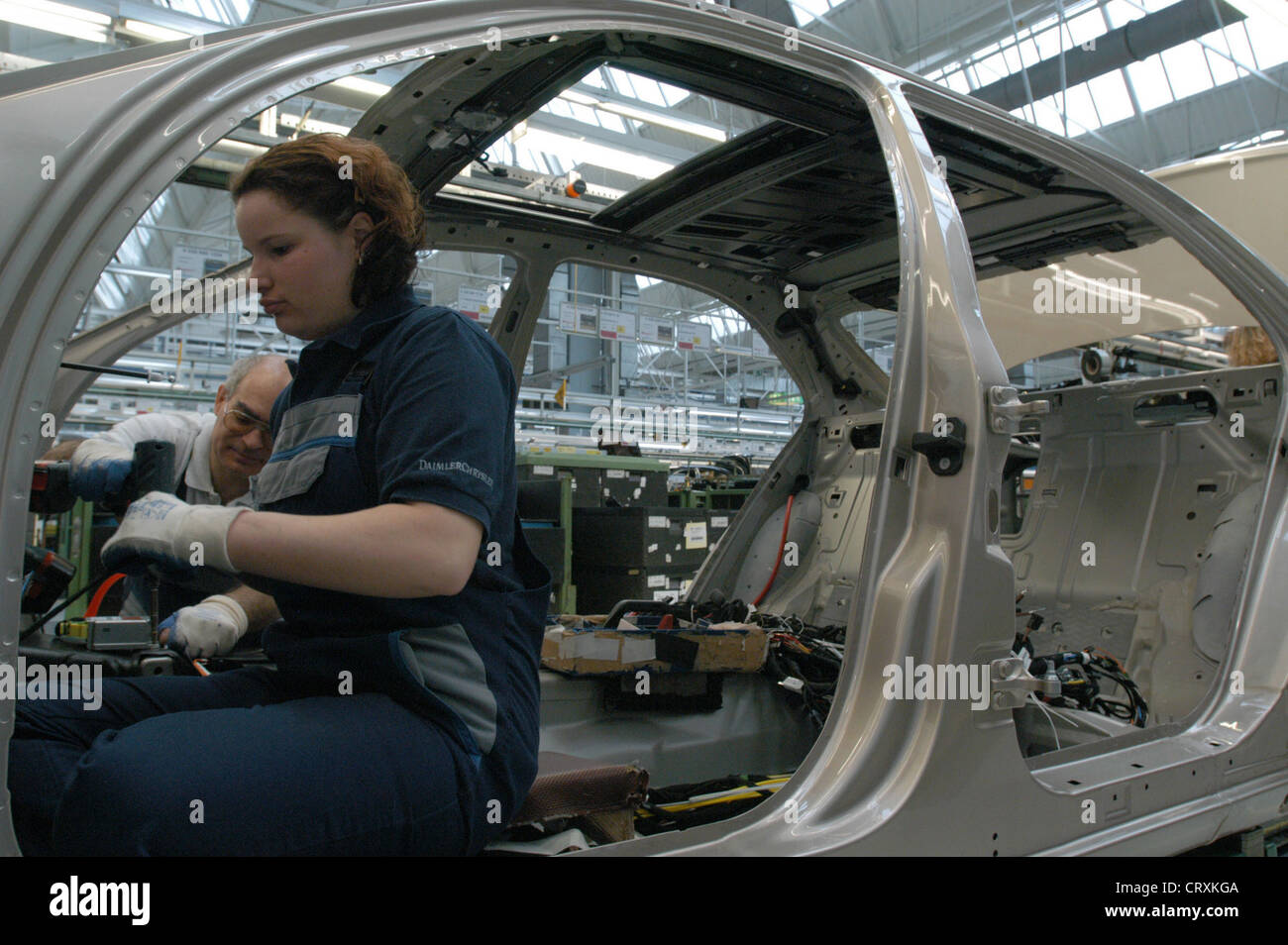 Car production line worker hi-res stock photography and images - Alamy