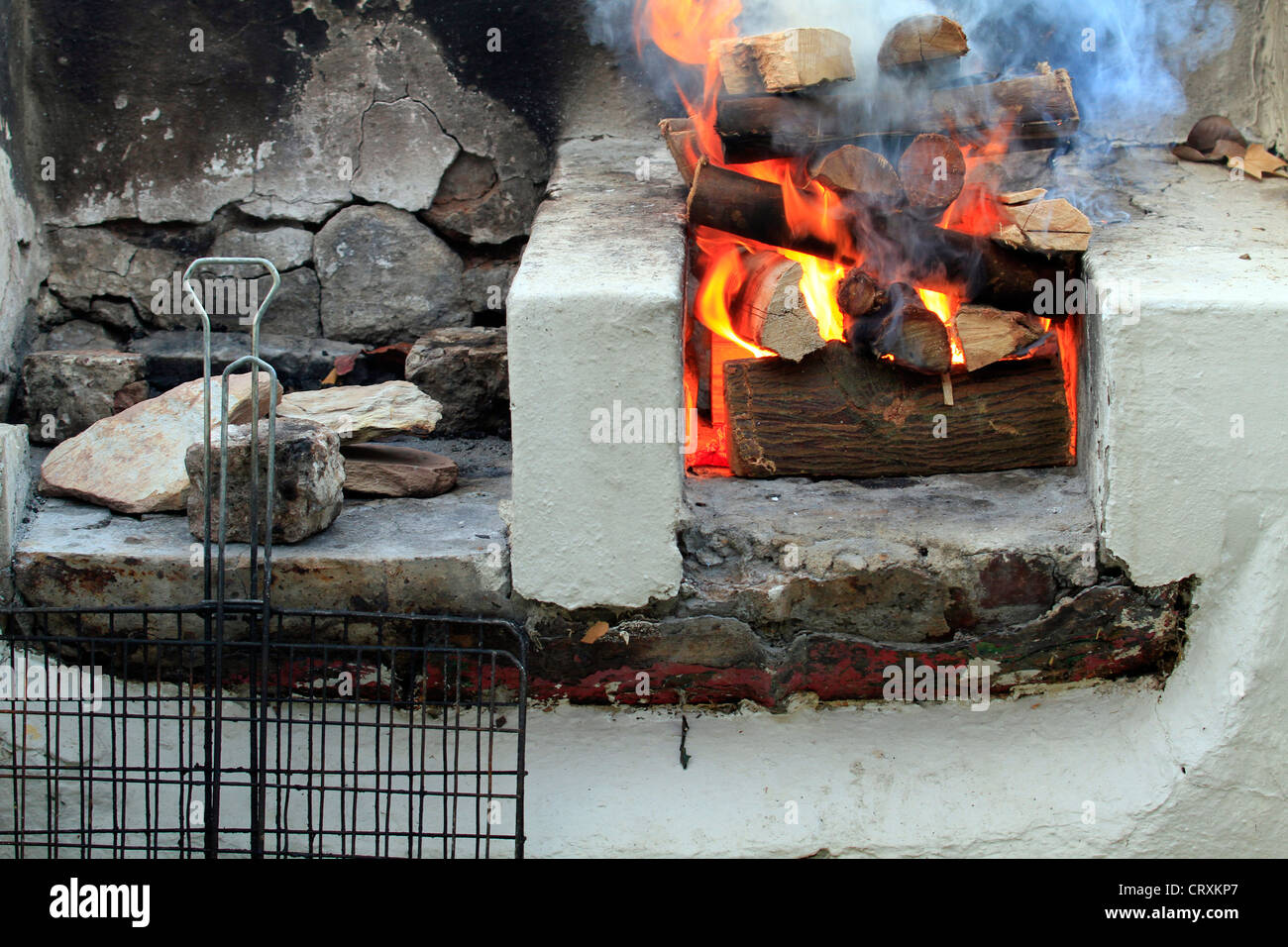 Lit fire in anticipation of a braai (barbecue) in South Africa Stock ...
