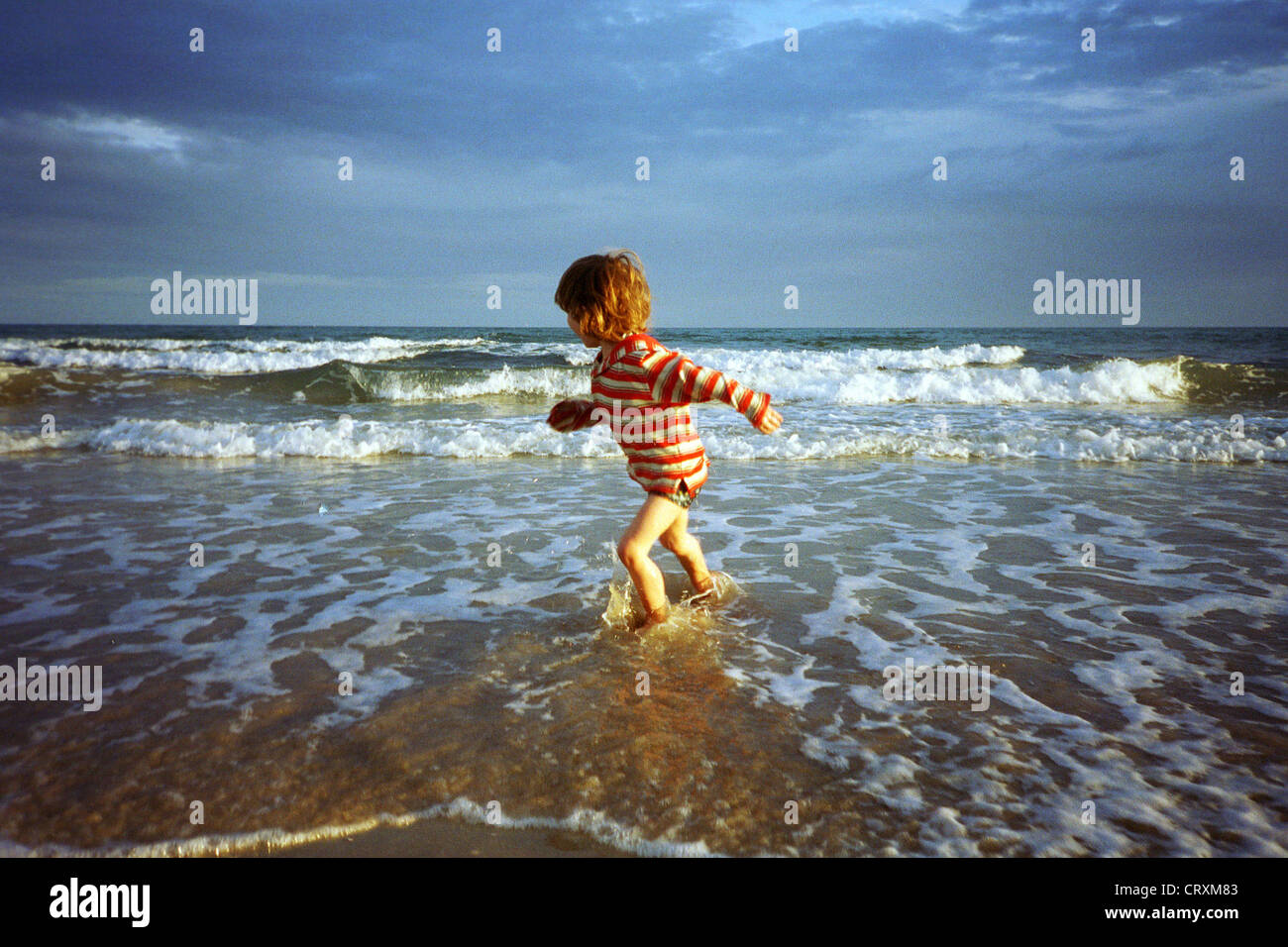 Child escaping from water hi-res stock photography and images - Alamy