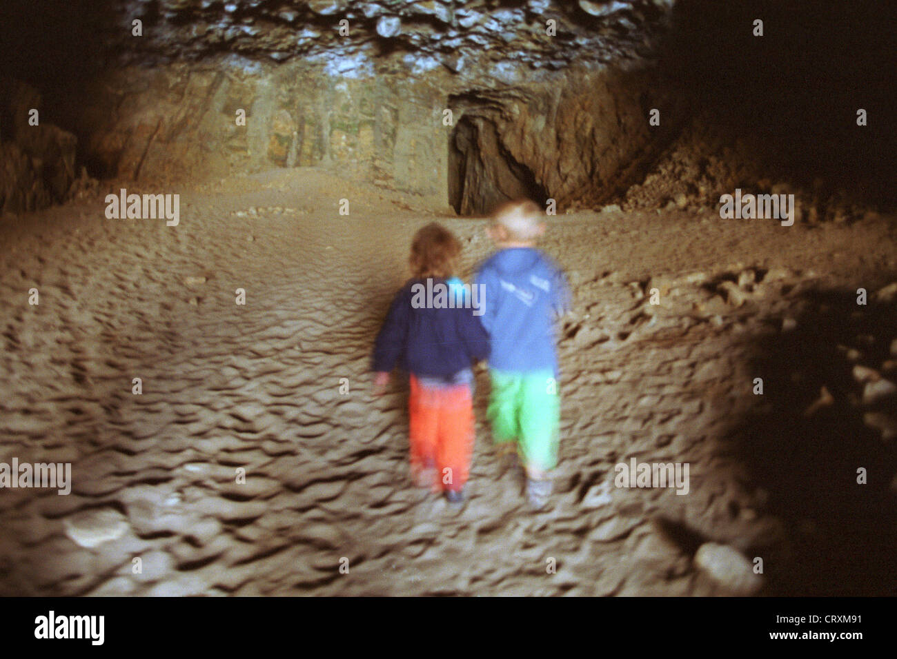 Children in a cave Stock Photo - Alamy