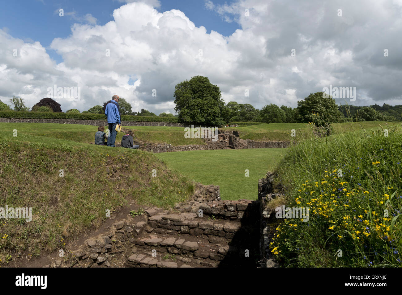 Visitors at Roman Amphitheater, Caerleon, Wales Stock Photo - Alamy