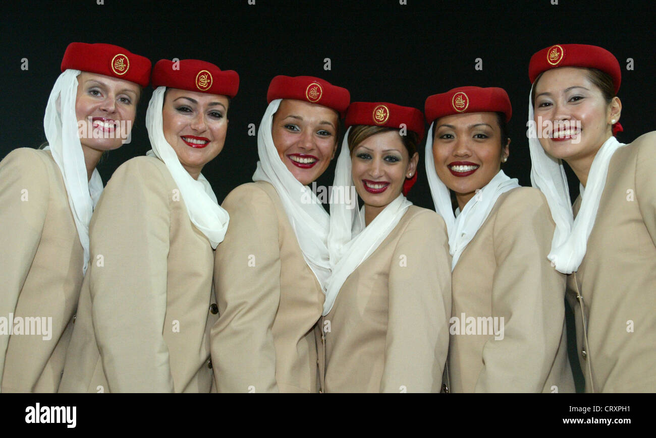 Emirates Airlines stewardesses in portrait Stock Photo - Alamy