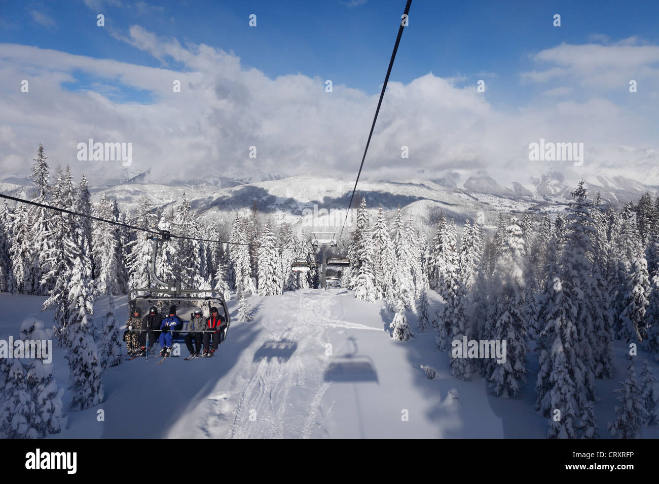 Austria, Styria, People in chair lift Stock Photo - Alamy