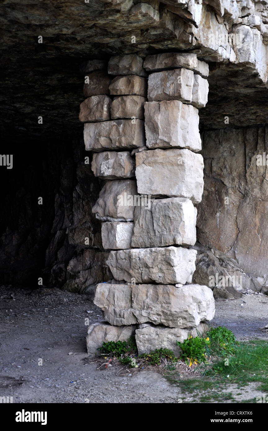 A stone support in one of the caves at Seacombe on the east Dorset ...
