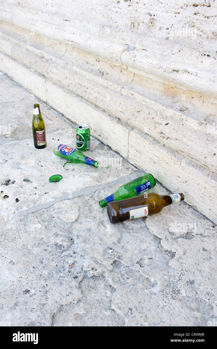Empty and broken beer bottles in public place Stock Photo - Alamy