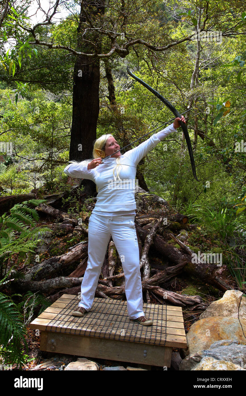 Elf with bow and arrow Stock Photo - Alamy