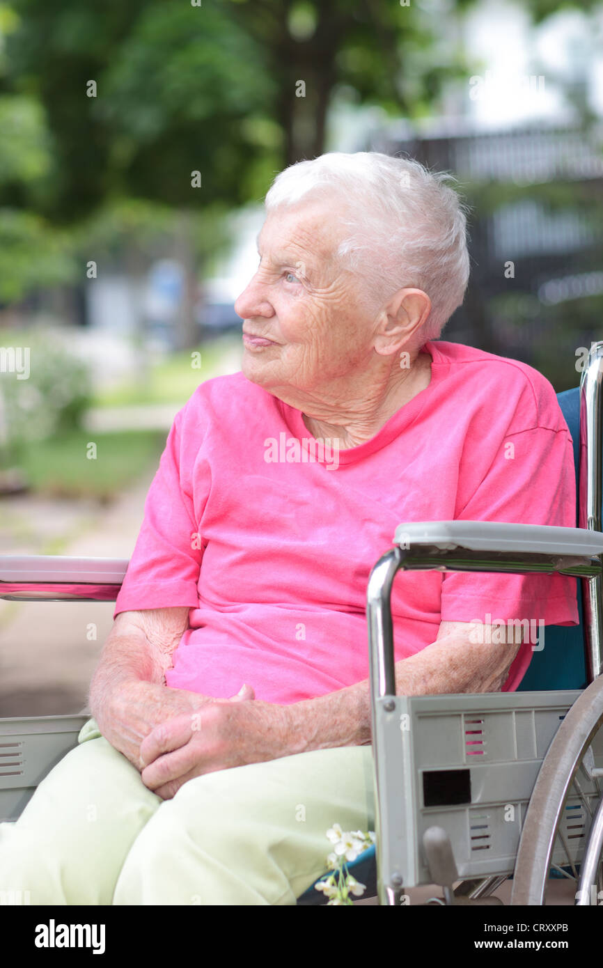 Senior Woman in a Wheelchair Stock Photo - Alamy