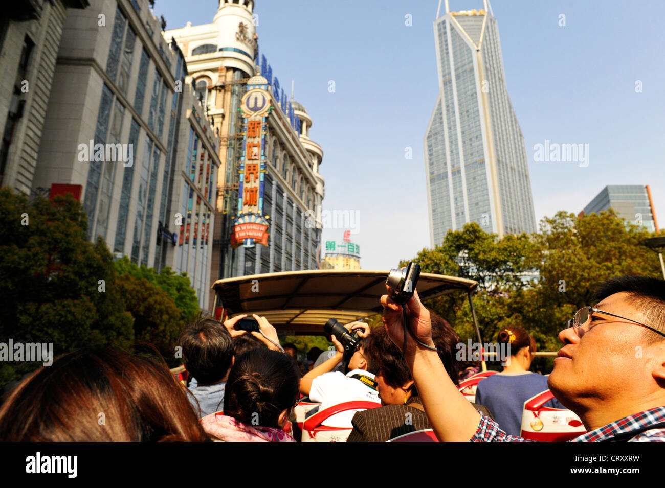 A tourist photographing Shanghai Stock Photo - Alamy