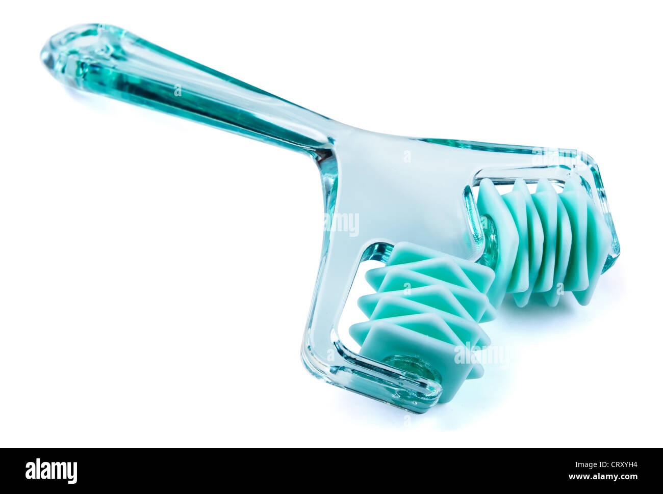 Plastic face and neck massager isoloated on white Stock Photo - Alamy