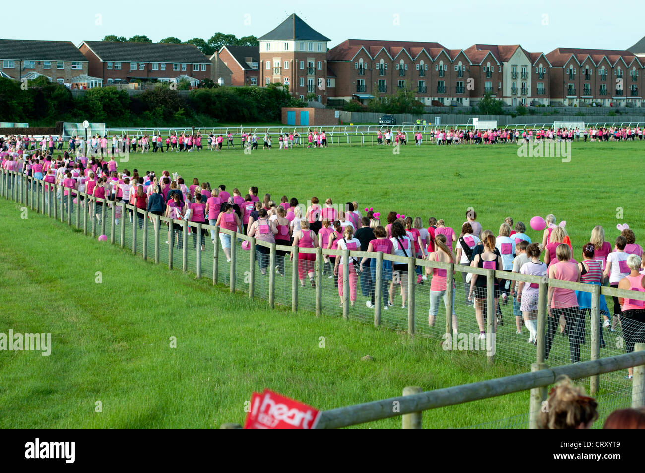 Women in the Race for Life at Stratford Racecourse Stock Photo - Alamy