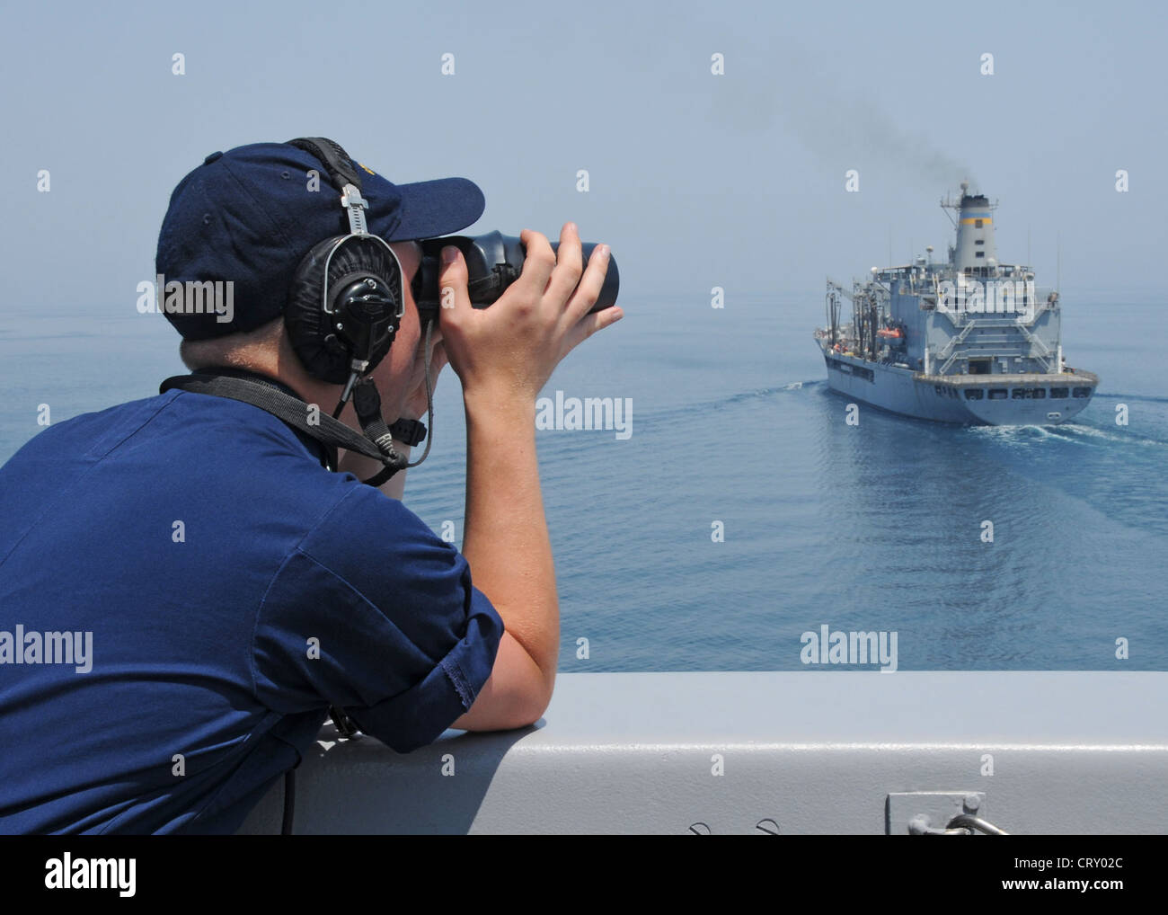 Yeoman 3rd Class Colin Gillett stands lookout watch aboard the ...