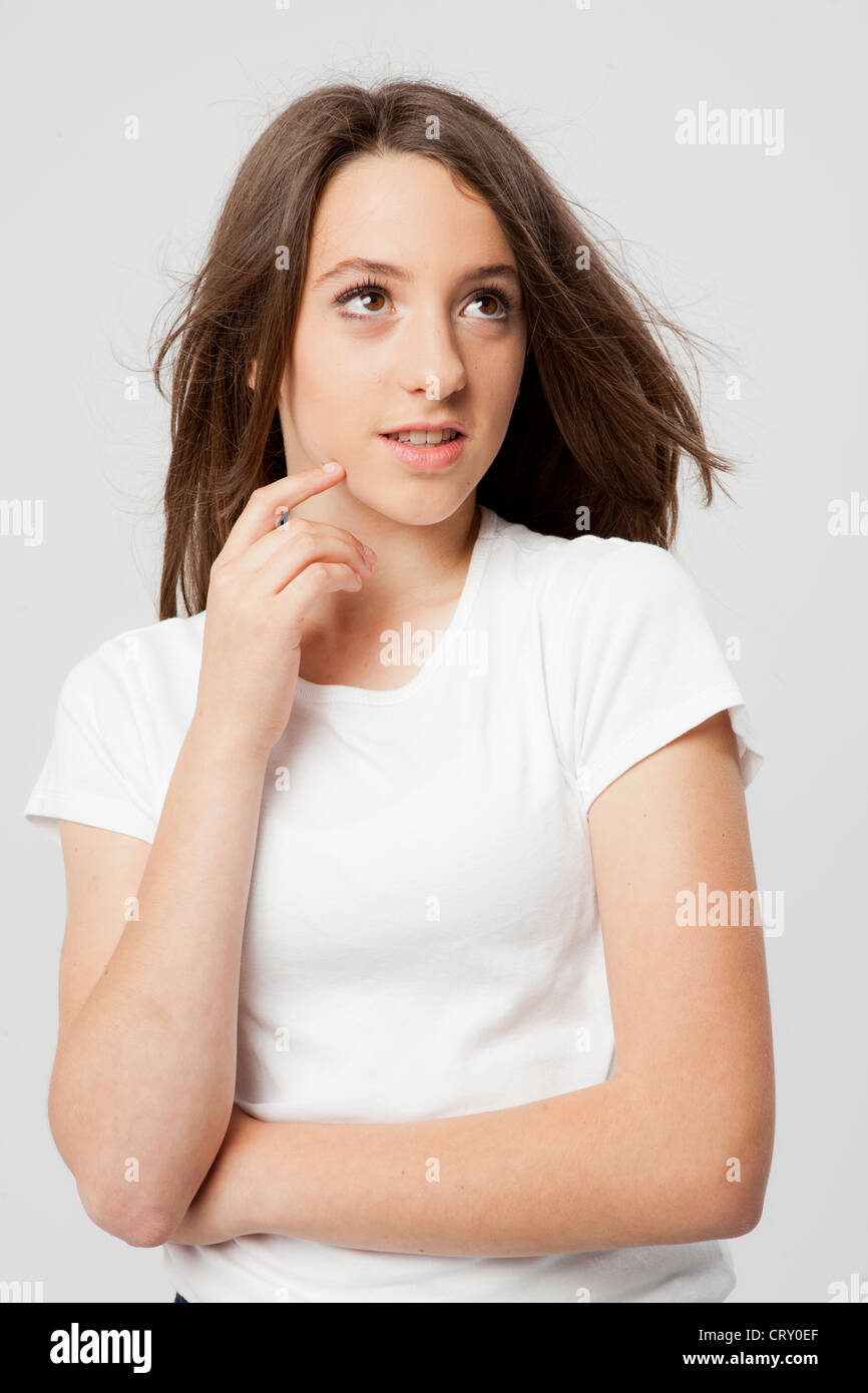expression and gesture of a real young girl looking upwards Stock Photo ...