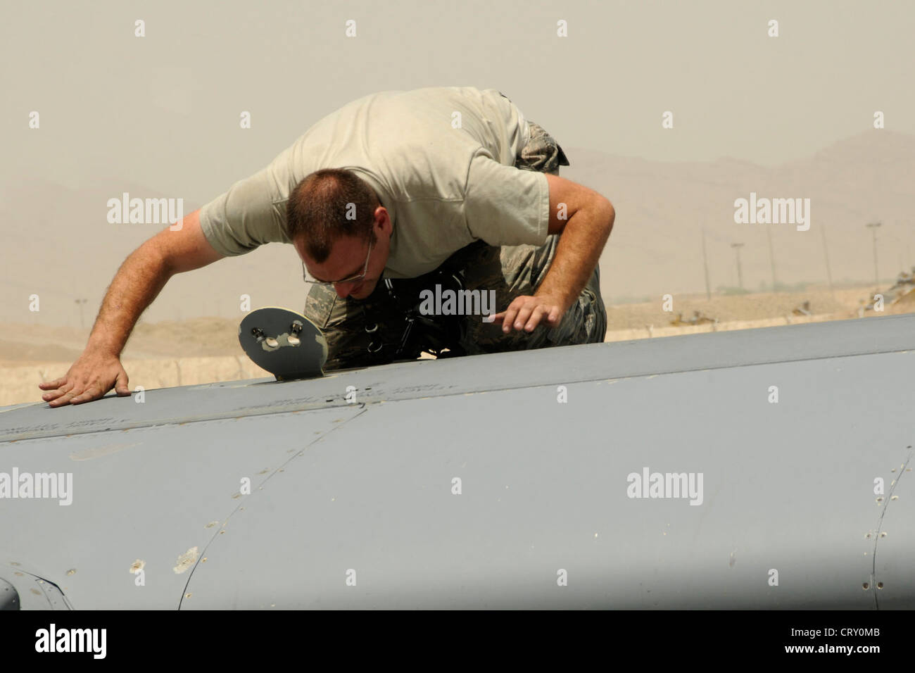 Staff Sgt. Dustin Elizono, a C-130 crew chief from the 317th Aircraft ...