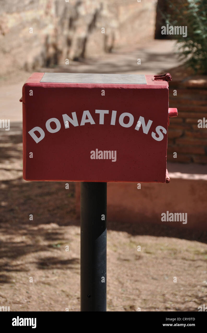 Donating money charity box hi-res stock photography and images - Alamy