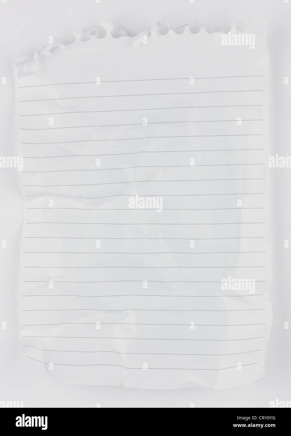 A piece of crumpled and creased lined whited notepaper from a spiral ...