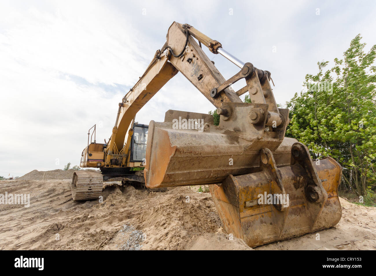 digger, heavy duty construction equipment parked at work site Stock ...